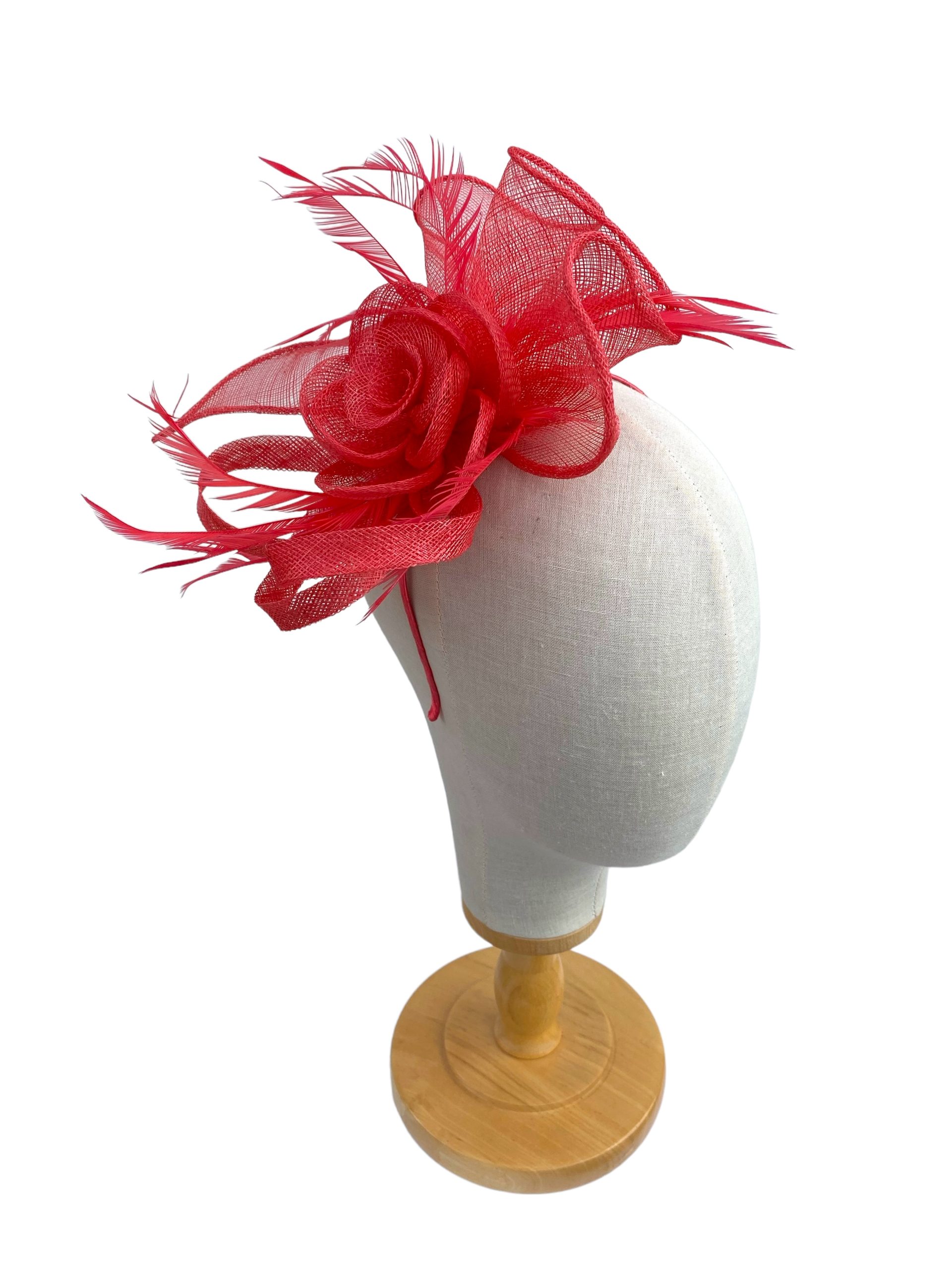 Coral Fascinator With Wavy Sinamay Base